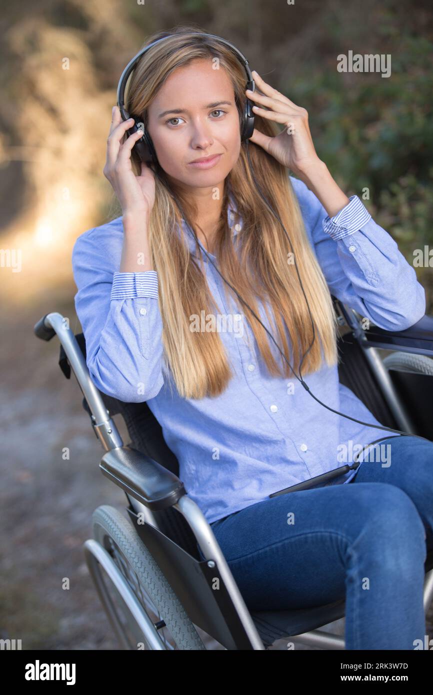 disabled young woman in wheelchair outdoors in rural scene Stock Photo ...