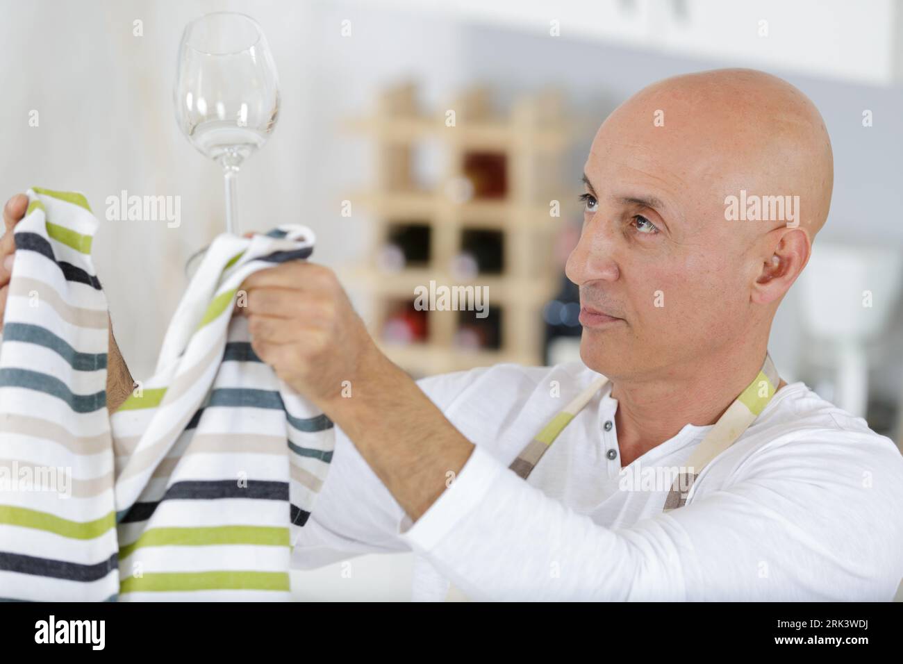 Caucasian male bartender wiping bar hi-res stock photography and images ...