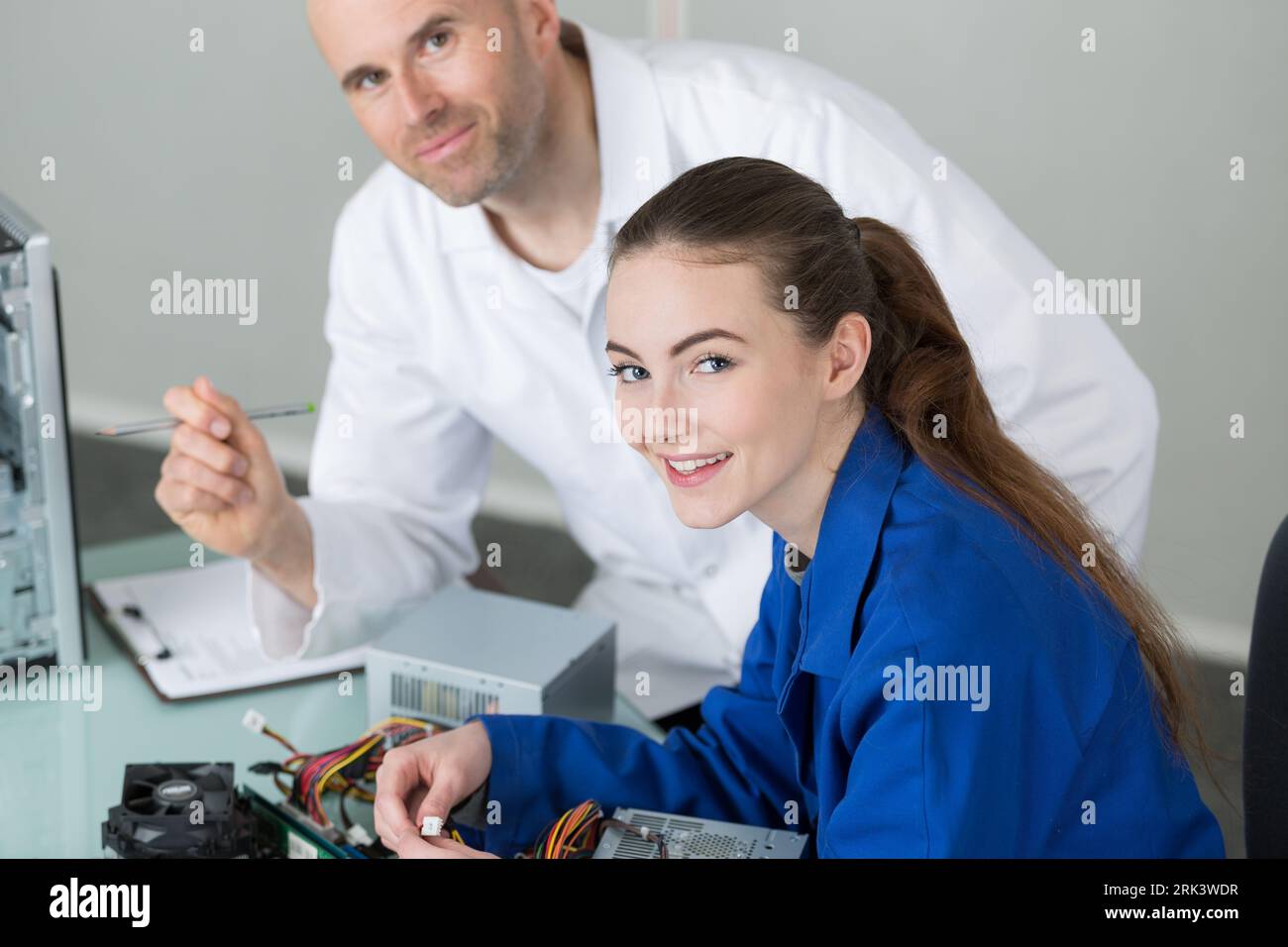 female engineering student smiling at camera Stock Photo - Alamy