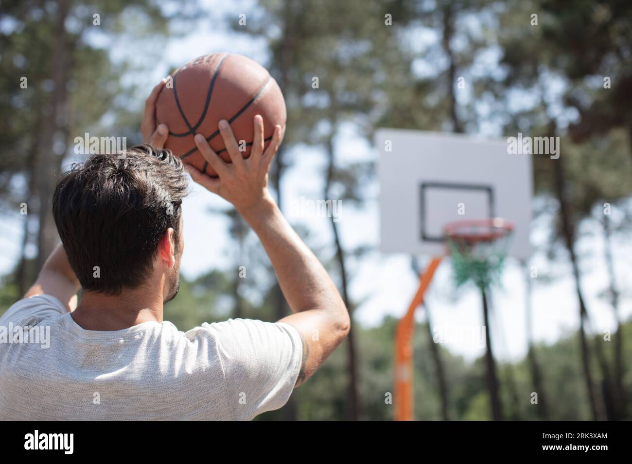 handsome male playing basketball outdoor Stock Photo - Alamy