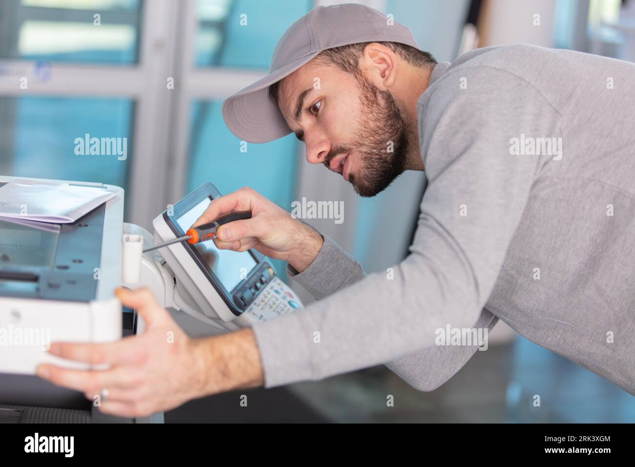 Technician man repairing photocopy hi-res stock photography and images ...