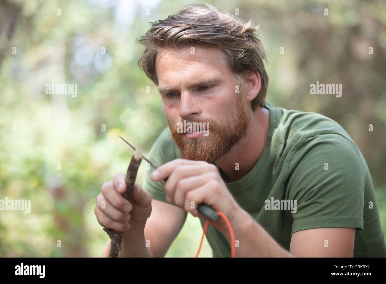 Person making bonfire hi-res stock photography and images - Alamy