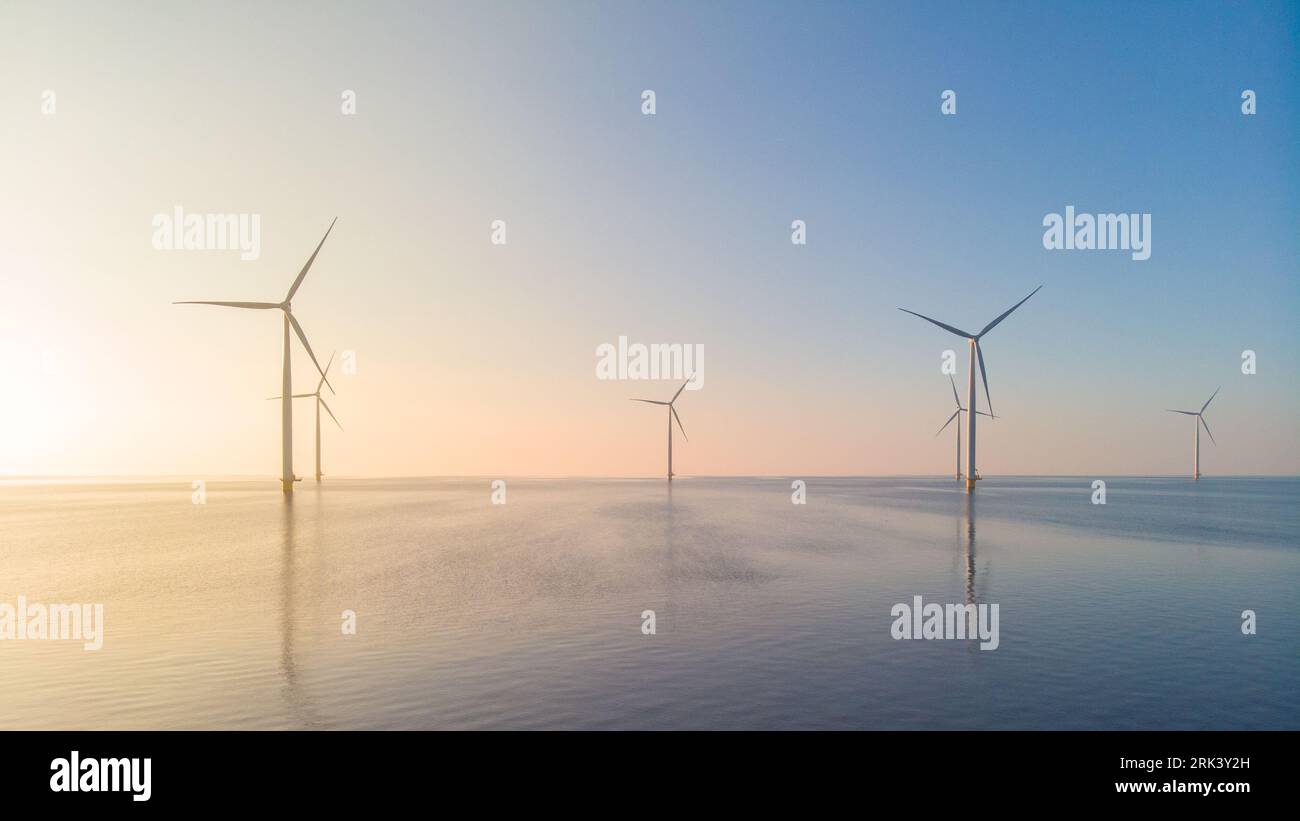 offshore windmill park, windmill park in the ocean aerial view with ...