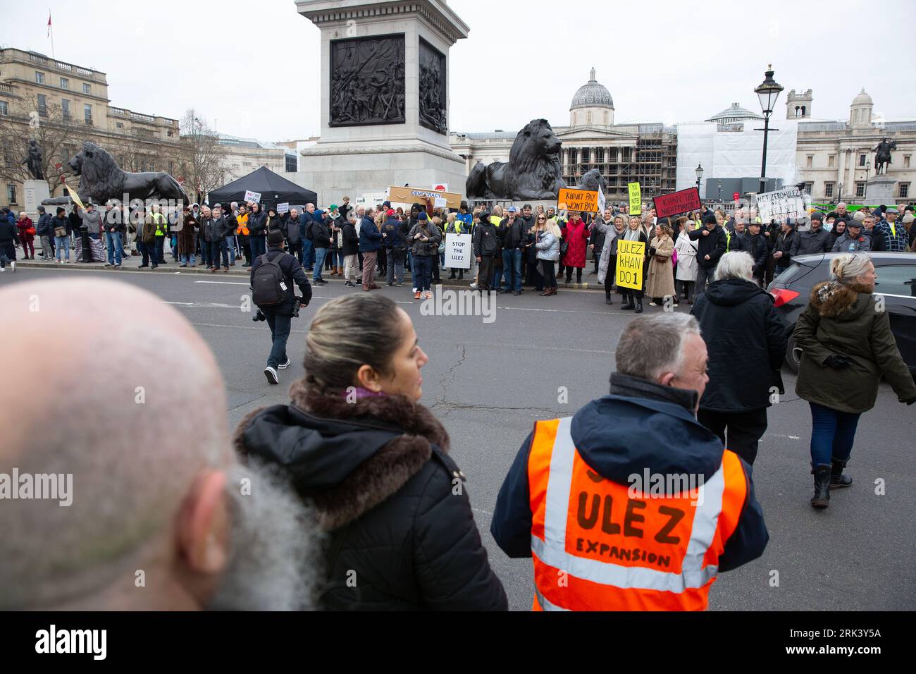 Participants gather with placards during a protest against the ...