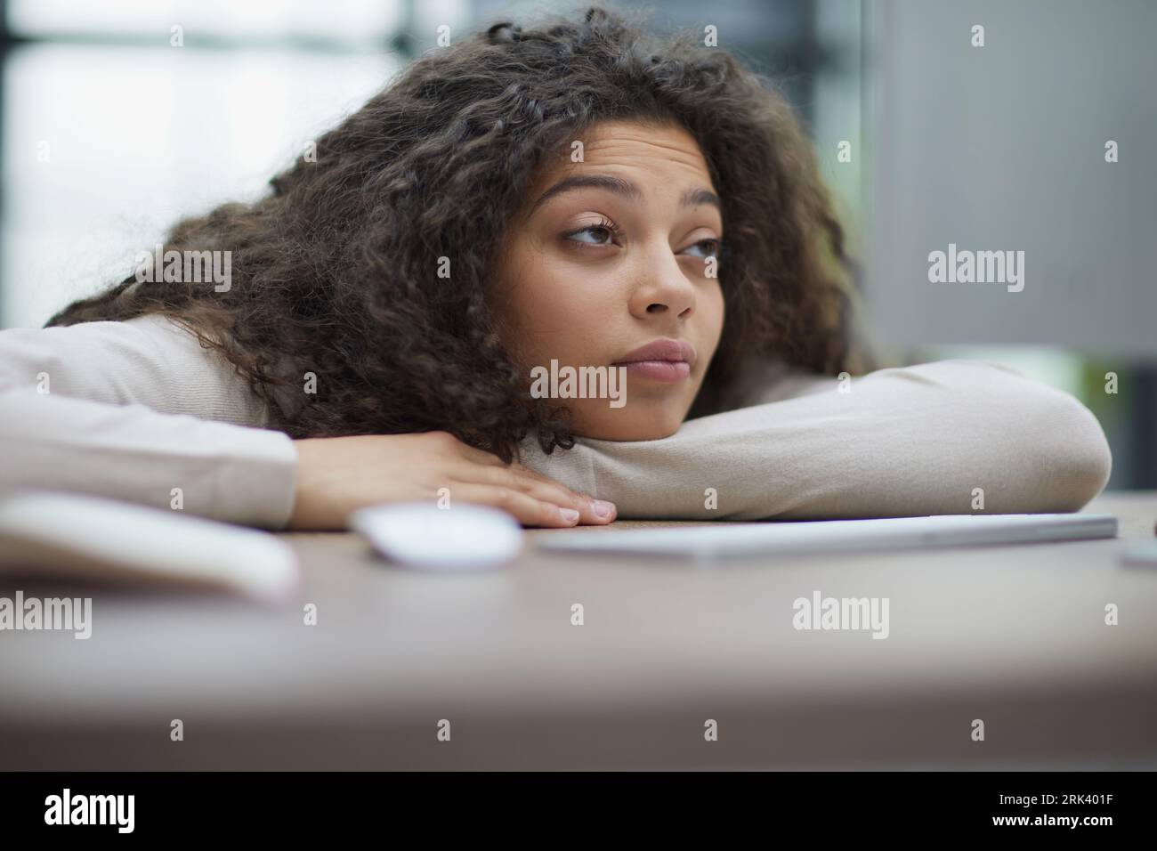 Tired overworked woman resting at workplace in office Stock Photo - Alamy