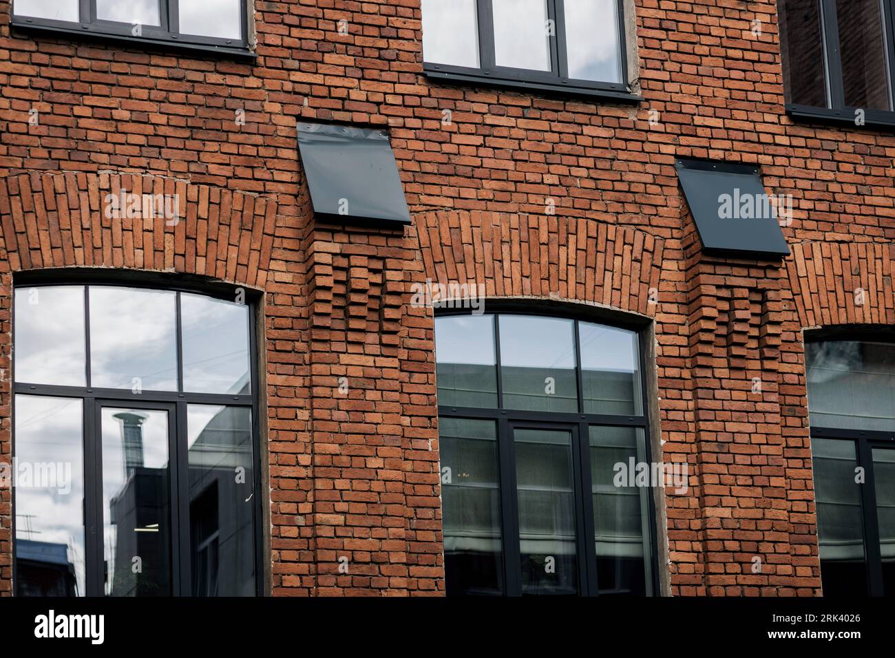 Brick Commercial Buildings Undulating Red Brick Facade Envelops 'wave'