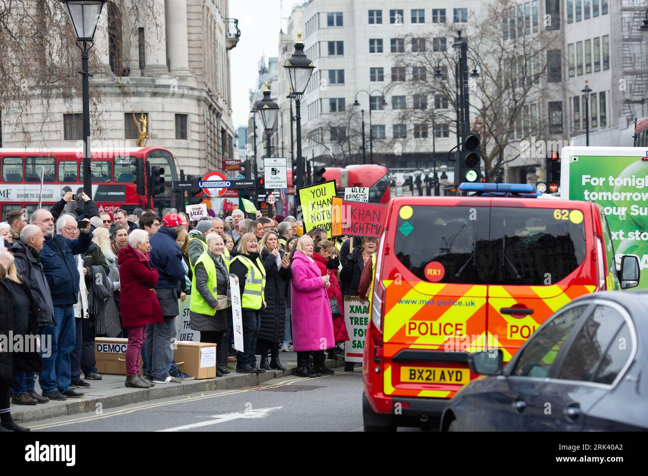 Participants gather with placards during a protest against the ...