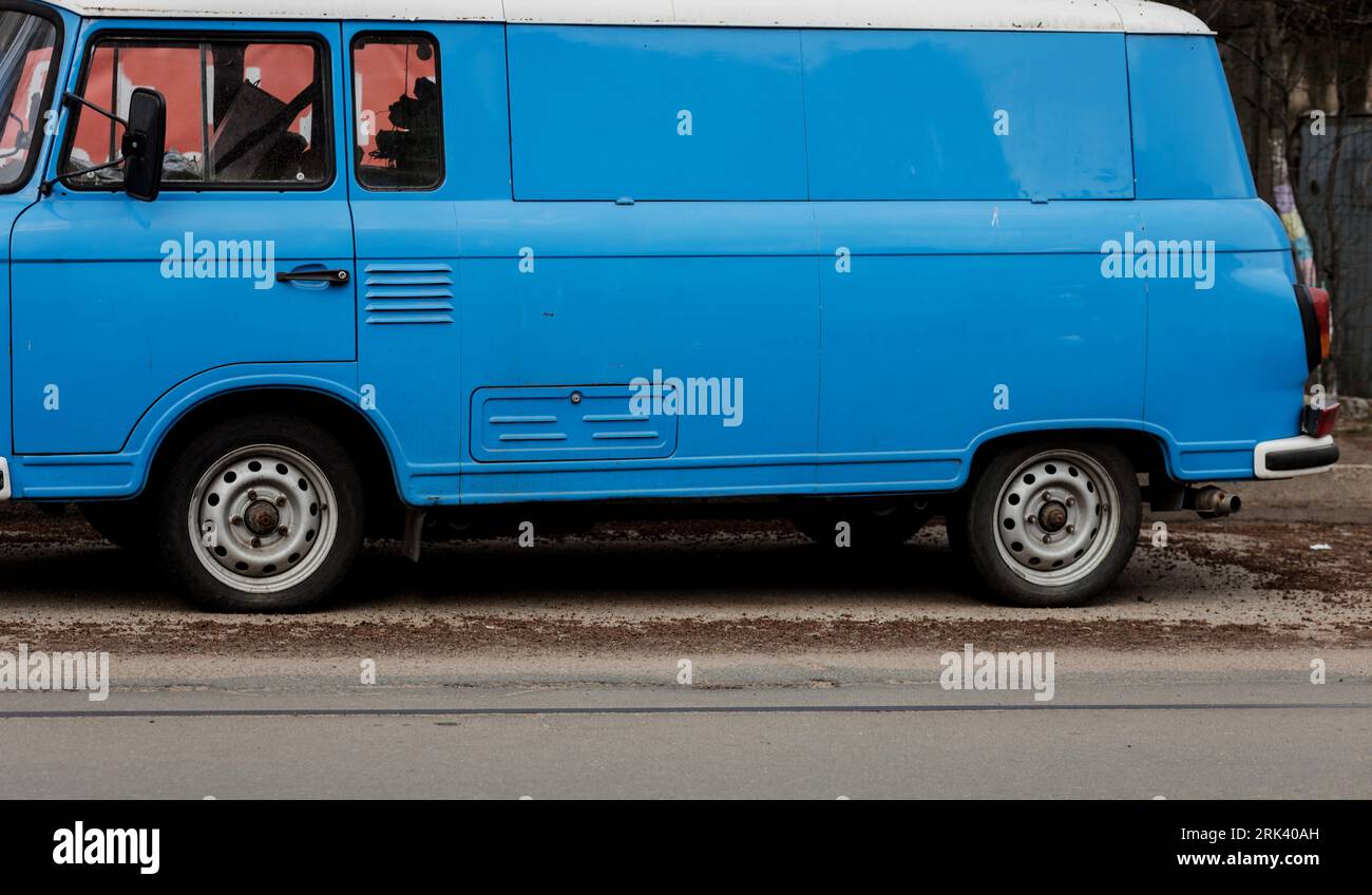 Old blue vintage van parked in city. retro transport Stock Photo - Alamy