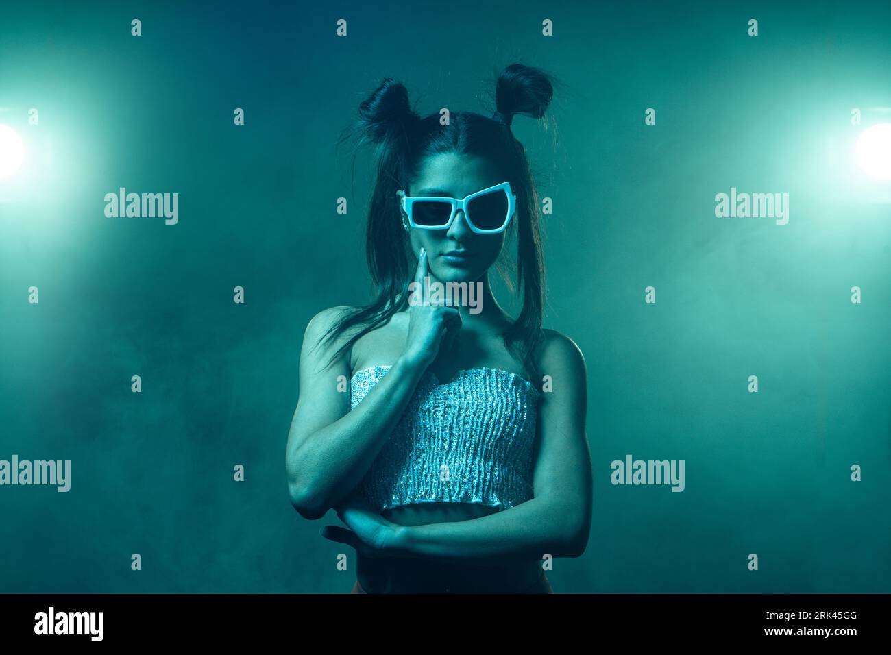 Portrait of beautiful cyber model woman posing wearing funny glasses on ...