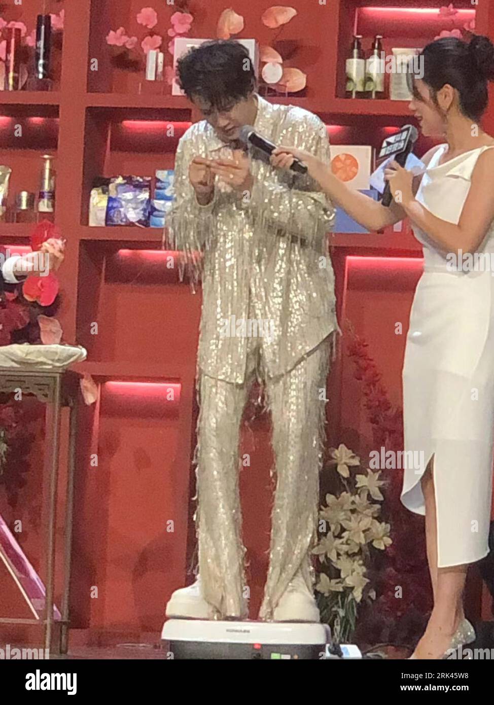 Chinese actor, singer, and dancer Tan Jianci attends an activity in ...