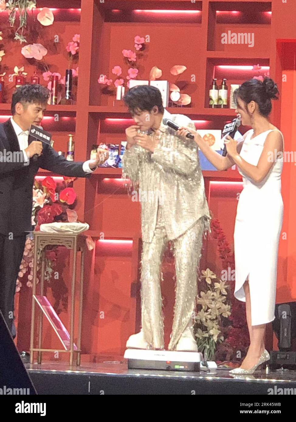 Chinese actor, singer, and dancer Tan Jianci attends an activity in ...