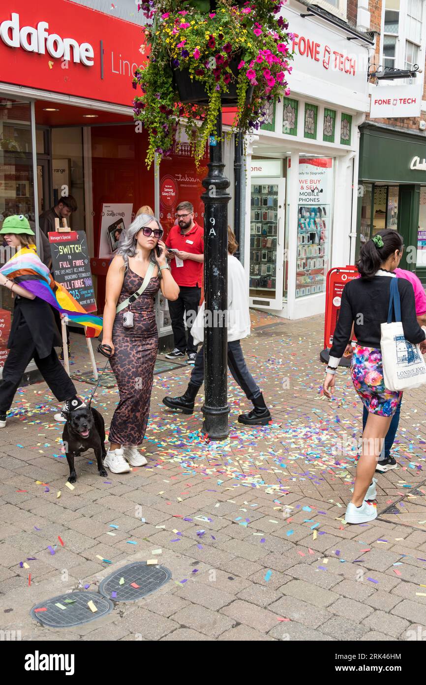 Tickertape mess from Lincoln Pride Parade, High Street, Lincoln City ...