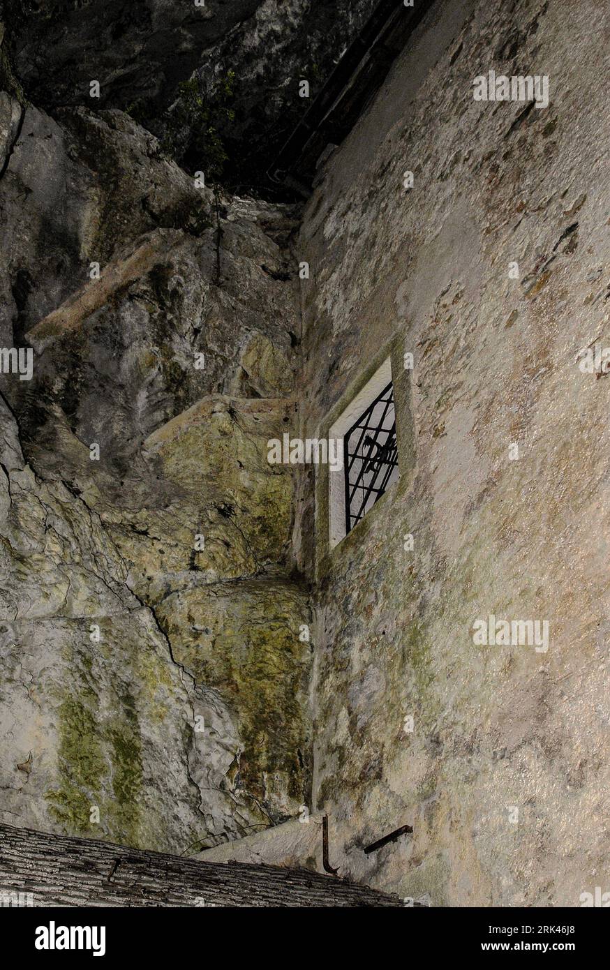 Walls and roof of medieval Predjama Castle in south-west Slovenia ...