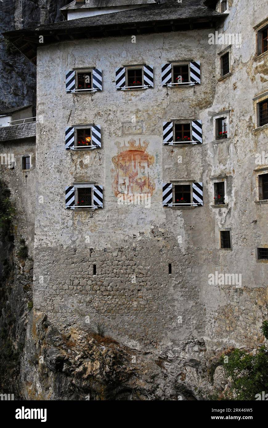 A faded coat of arms and the date 1570 commemorate a Renaissance ...