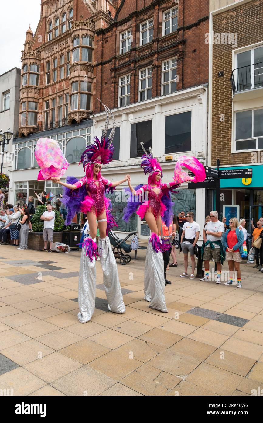 Two young women on stilts hi-res stock photography and images - Alamy