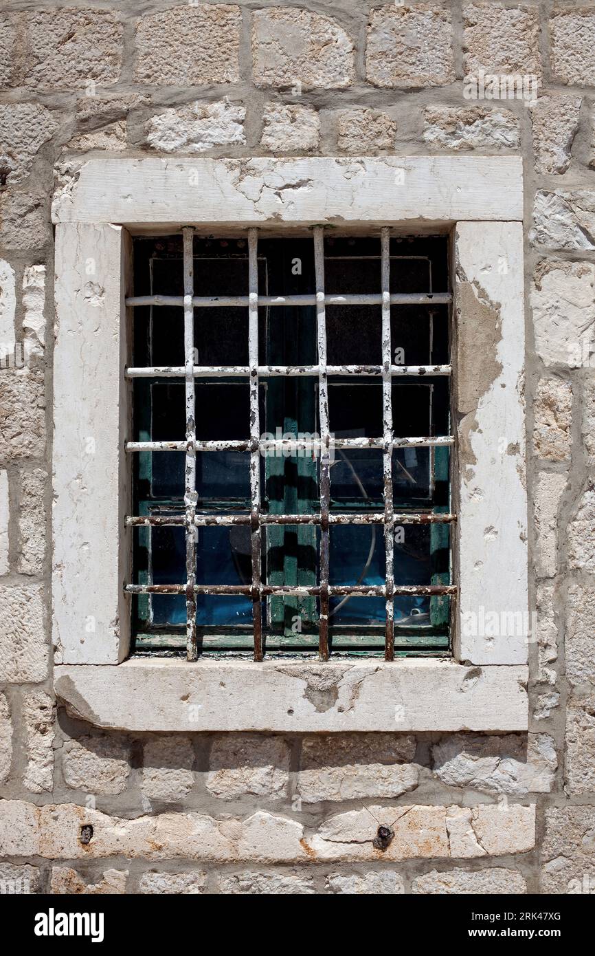 Old stone building texture background street view wall Stock Photo - Alamy