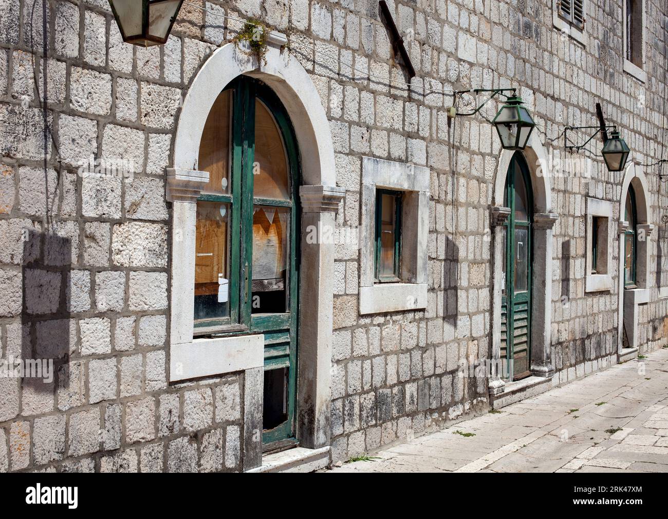 Old stone building texture background street view wall Stock Photo - Alamy