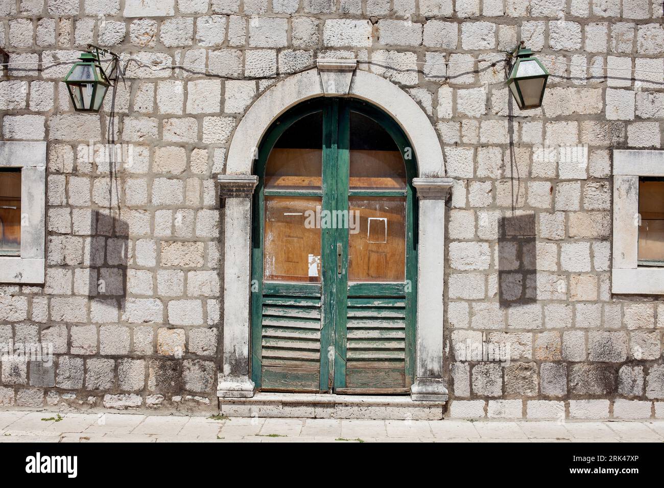 Old stone building texture background street view wall Stock Photo - Alamy