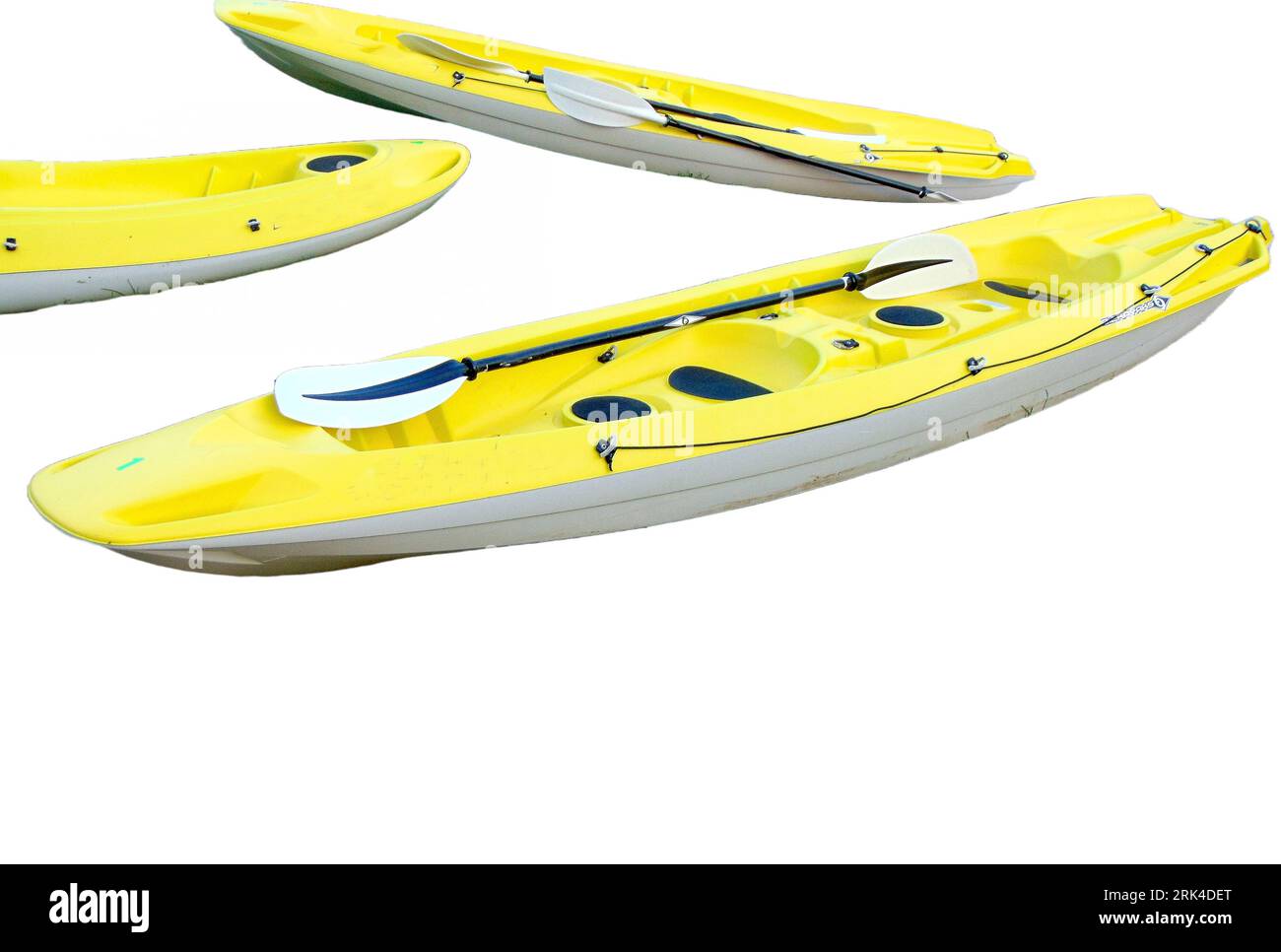 Yellow kayaks isolated on white background Stock Photo - Alamy
