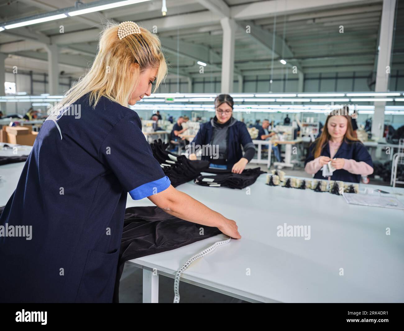 several sewing machines. Tailoring industry. jean making factory. jean ...