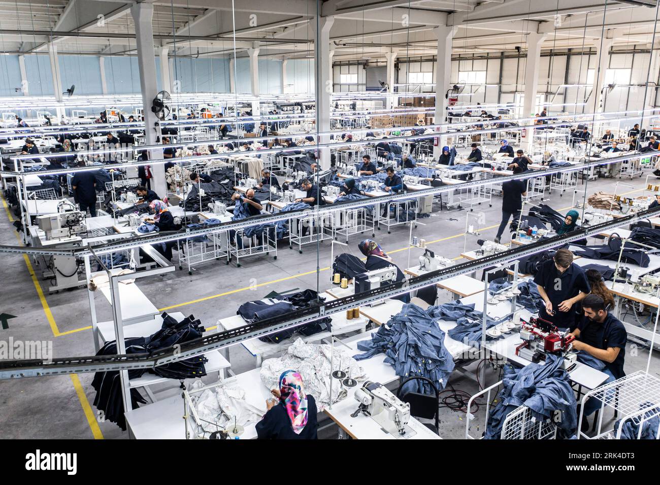 Process of denim jeans manufacturing hi-res stock photography and ...