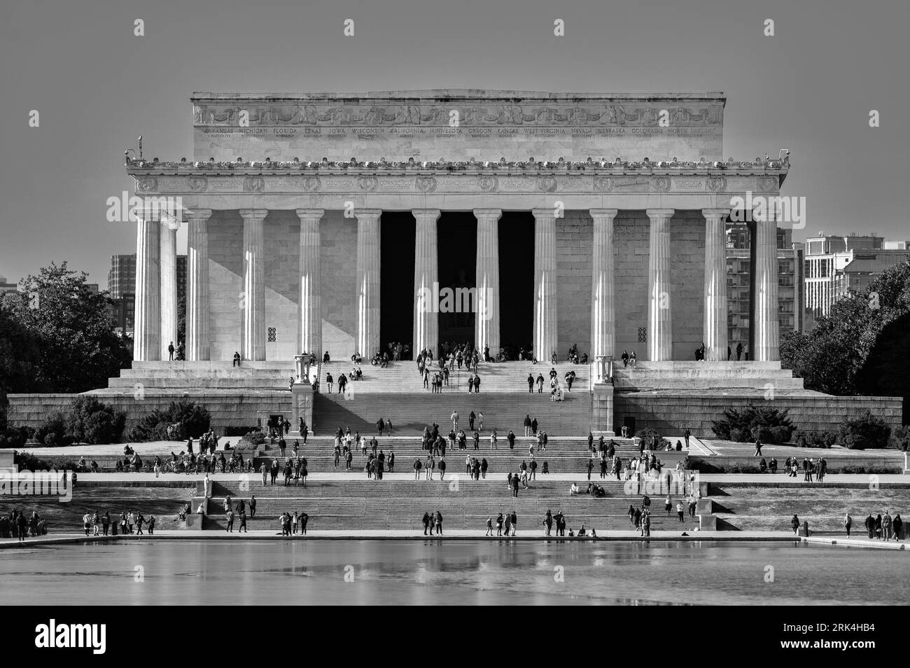 A diverse crowd of people in front of the iconic Lincoln Memorial in ...