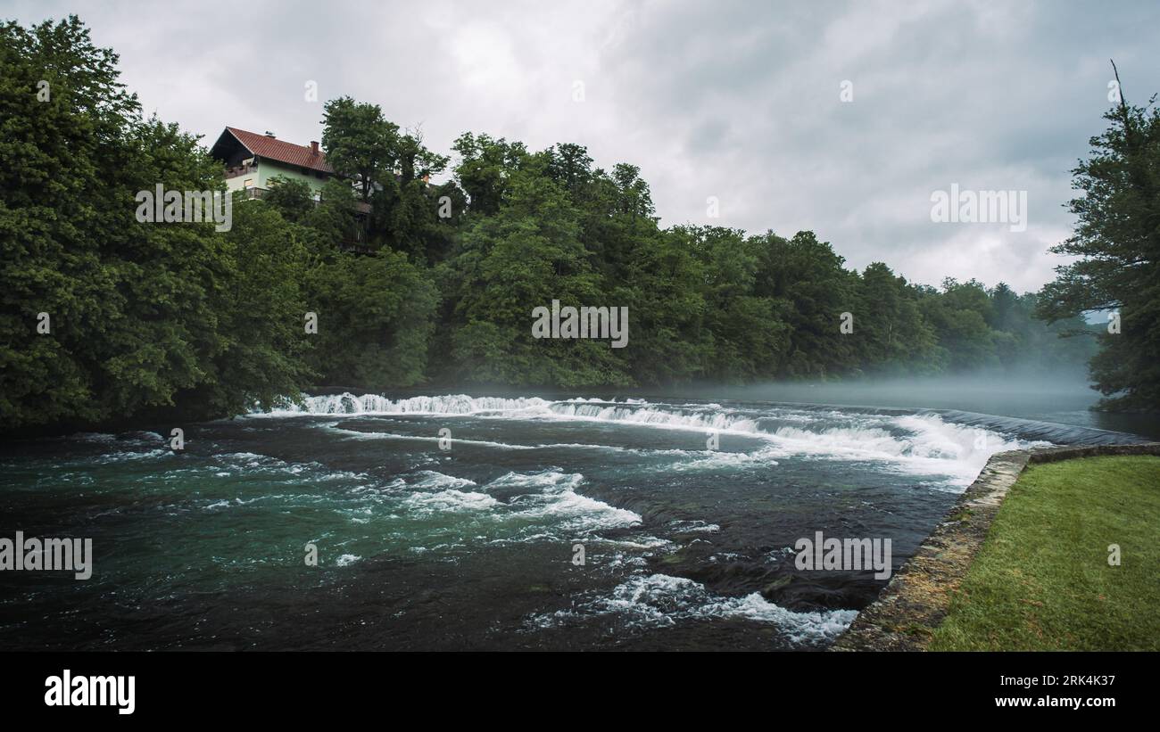 A scenic view of the Krka River shrouded in thin fog Stock Photo - Alamy