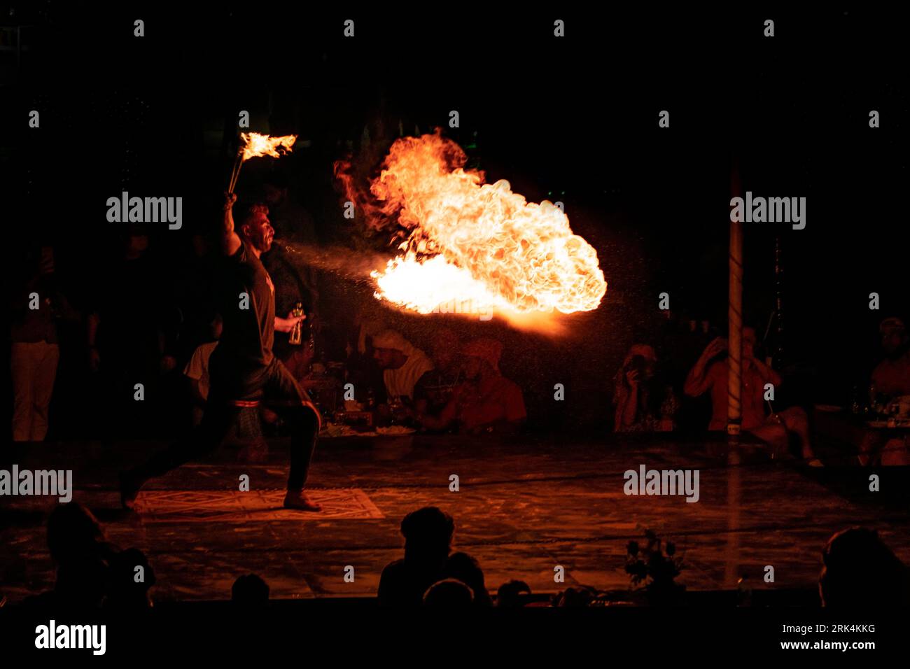 A male performer performing a captivating fire show Stock Photo - Alamy