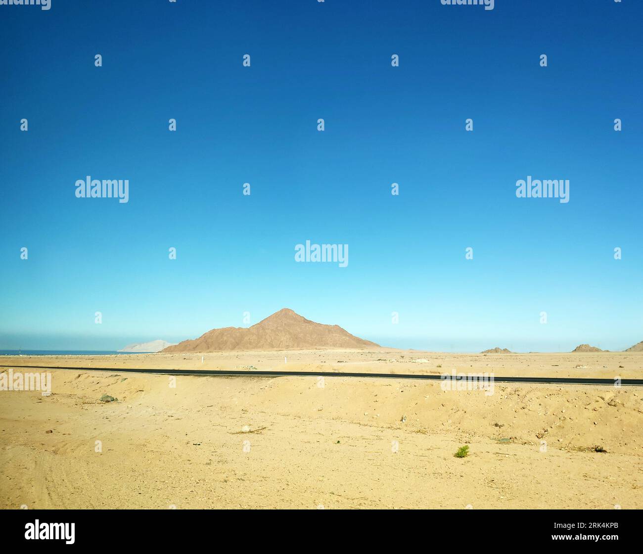 Volcano in the desert and a road, mountains landscape wallpaper ...