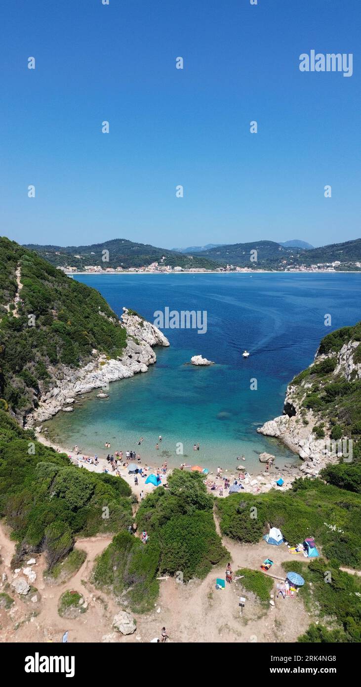 An aerial view of the rocky shoreline of Corfu, Greece with its crystal ...