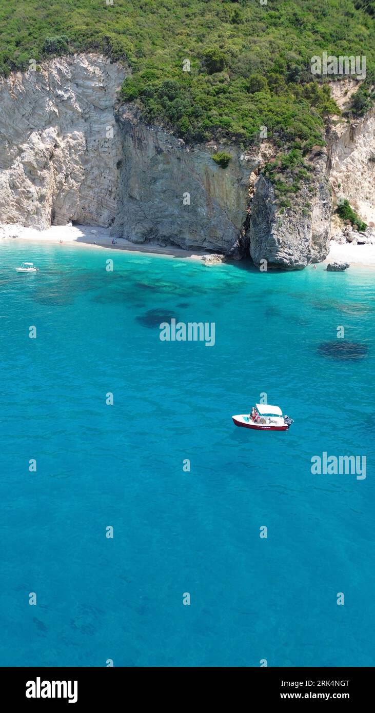 An aerial view of the rocky shoreline of Corfu, Greece with its crystal ...