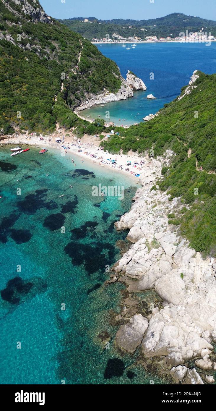 An aerial view of the rocky shoreline of Corfu, Greece with its crystal ...
