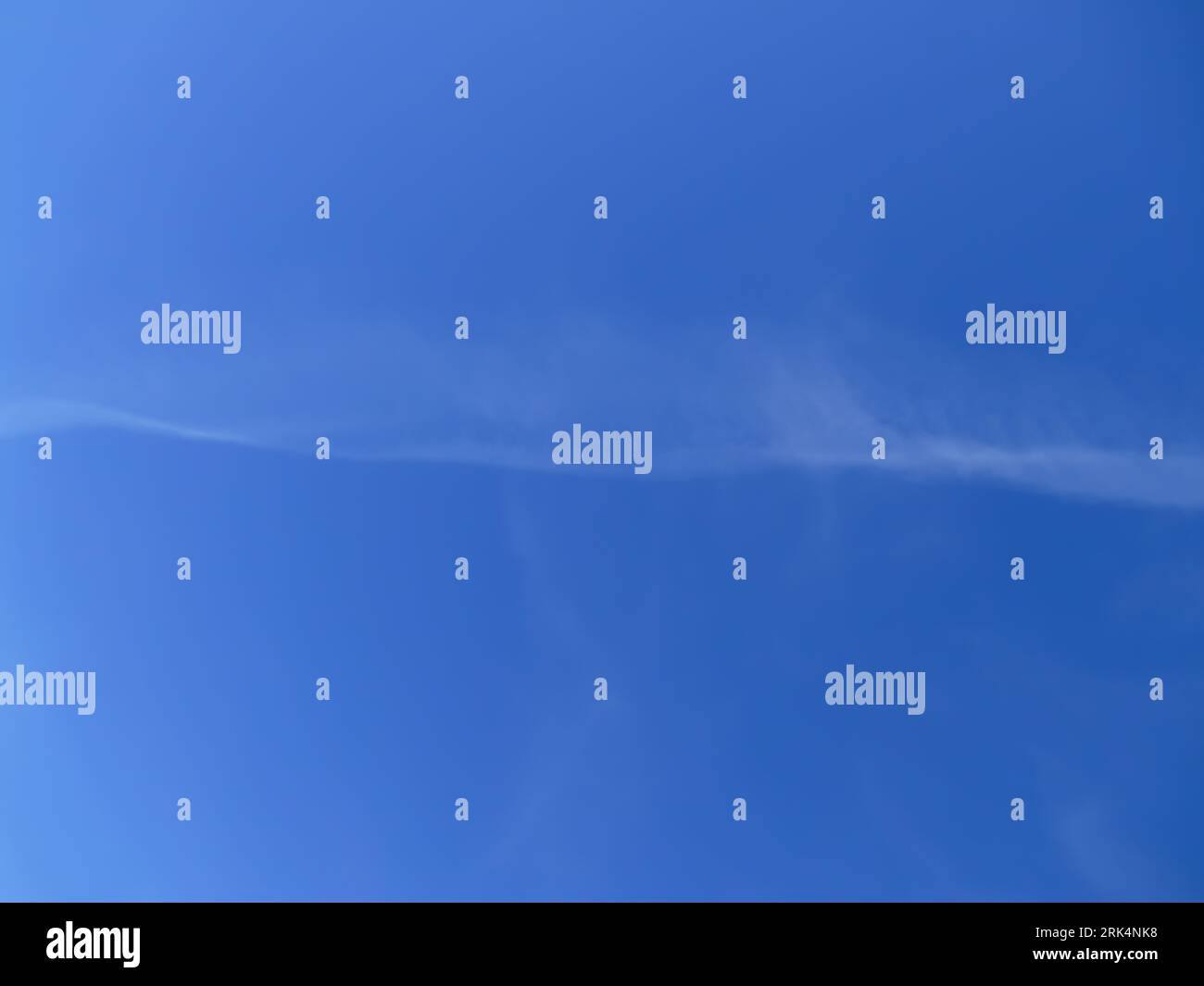 Background with blue sky and light horizontal long cloud Stock Photo ...