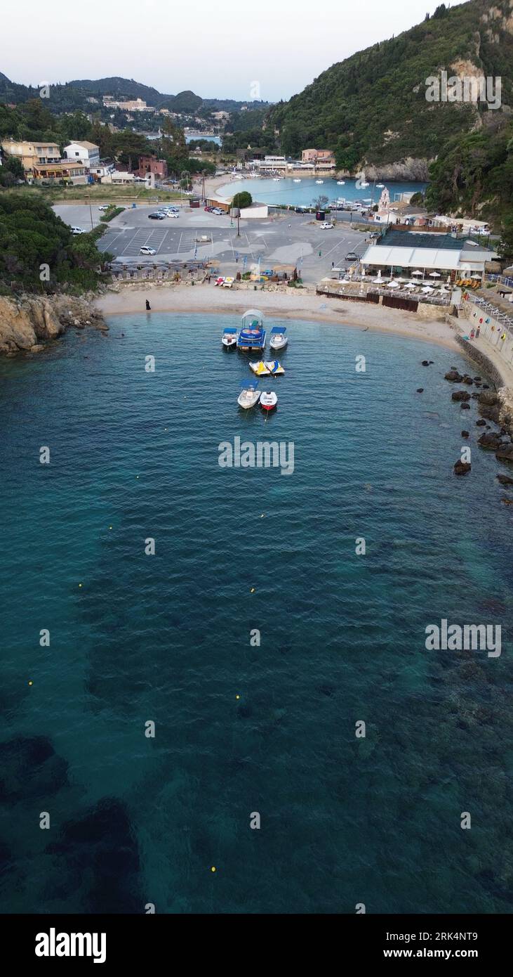 An aerial view of the rocky shoreline of Corfu, Greece with its crystal ...
