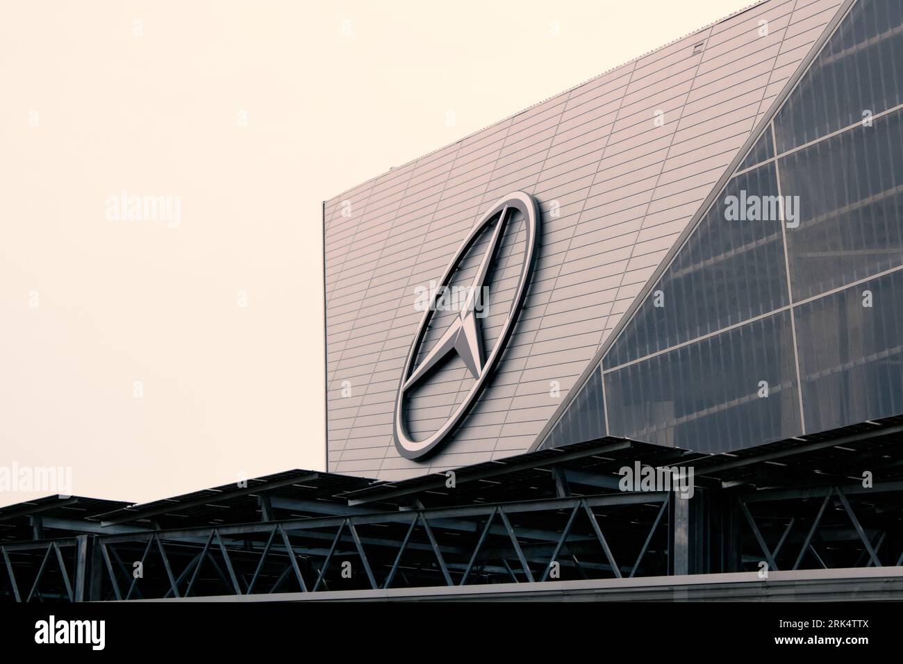 An exterior view of a skyscraper featuring a logo of the iconic ...