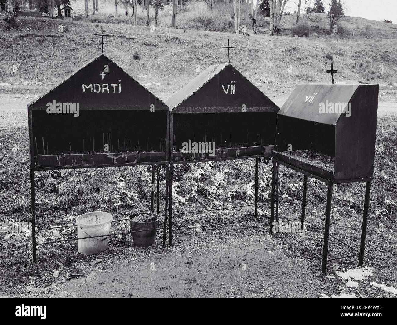 Three black boxes featuring white lettering arranged in a triangular ...