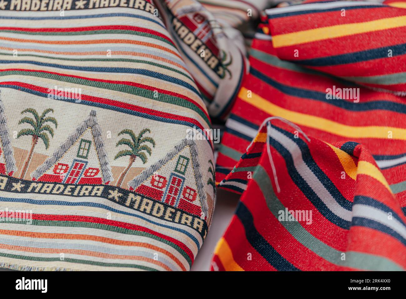 A vibrant Madeira Island themed fabric featuring a pattern of palm ...