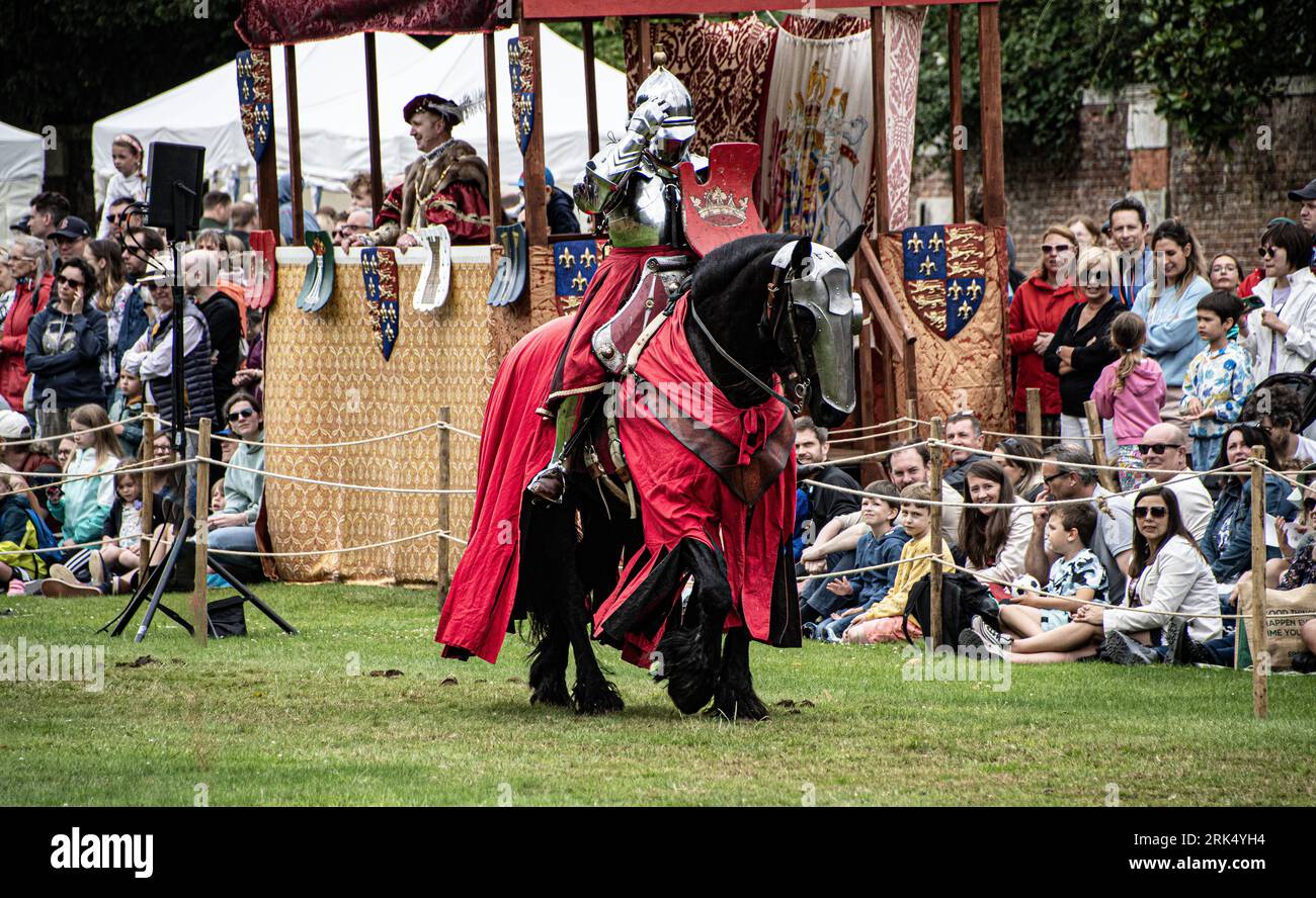 Hampton court palace red Knight of the crown parading before Henry ...