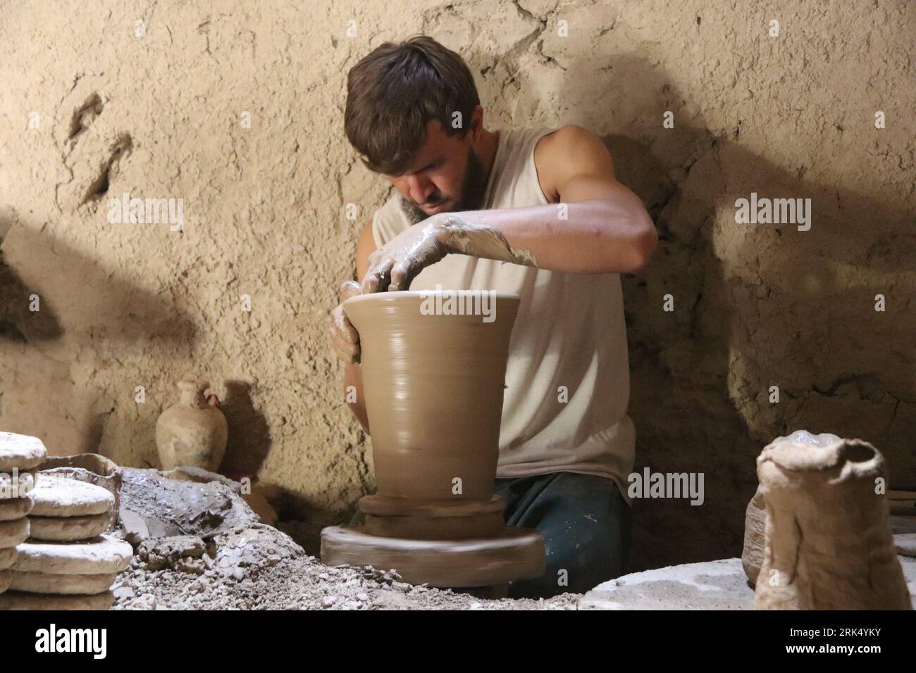 Balkh, Afghanistan. 23rd Aug, 2023. A potter makes pottery in Balkh ...