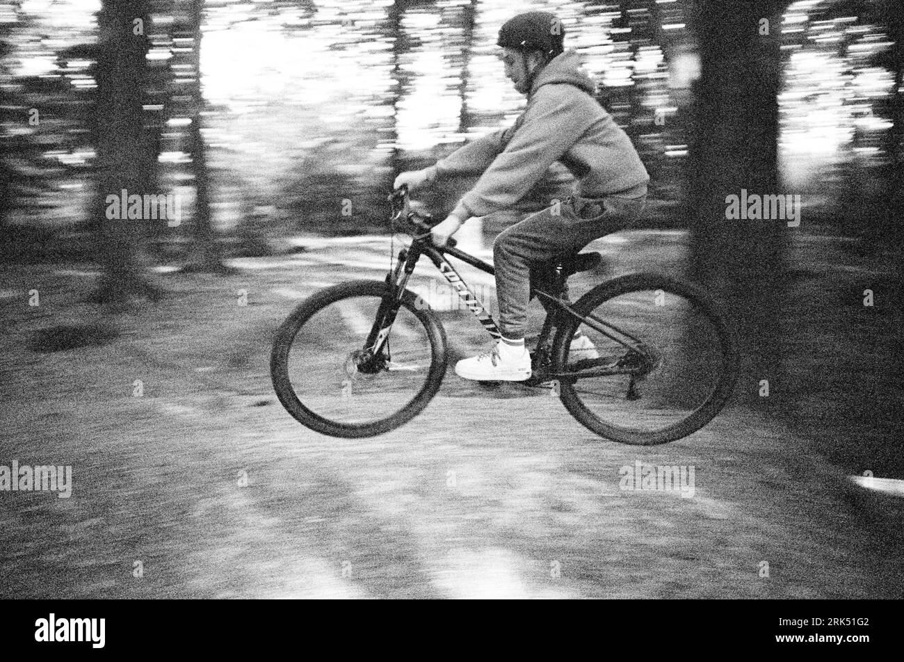 Teenage boy on a mountain bike, Chawton Woods, Medstead, Alton ...