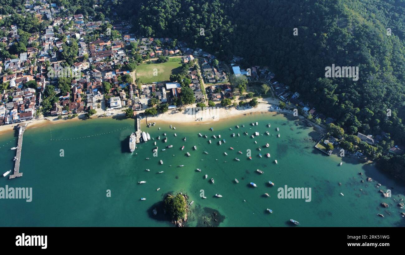 An aerial view of a tropical island and secluded bay in Ilha Grande ...