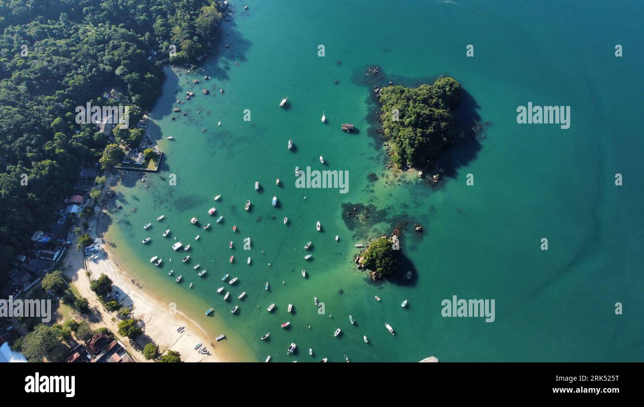 An aerial view of a tropical island and secluded bay in Ilha Grande ...