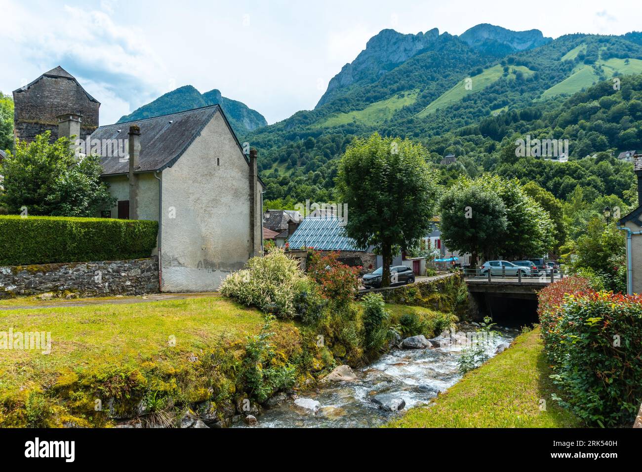 An idyllic scene of a quaint bridge spanning a tranquil body of water ...