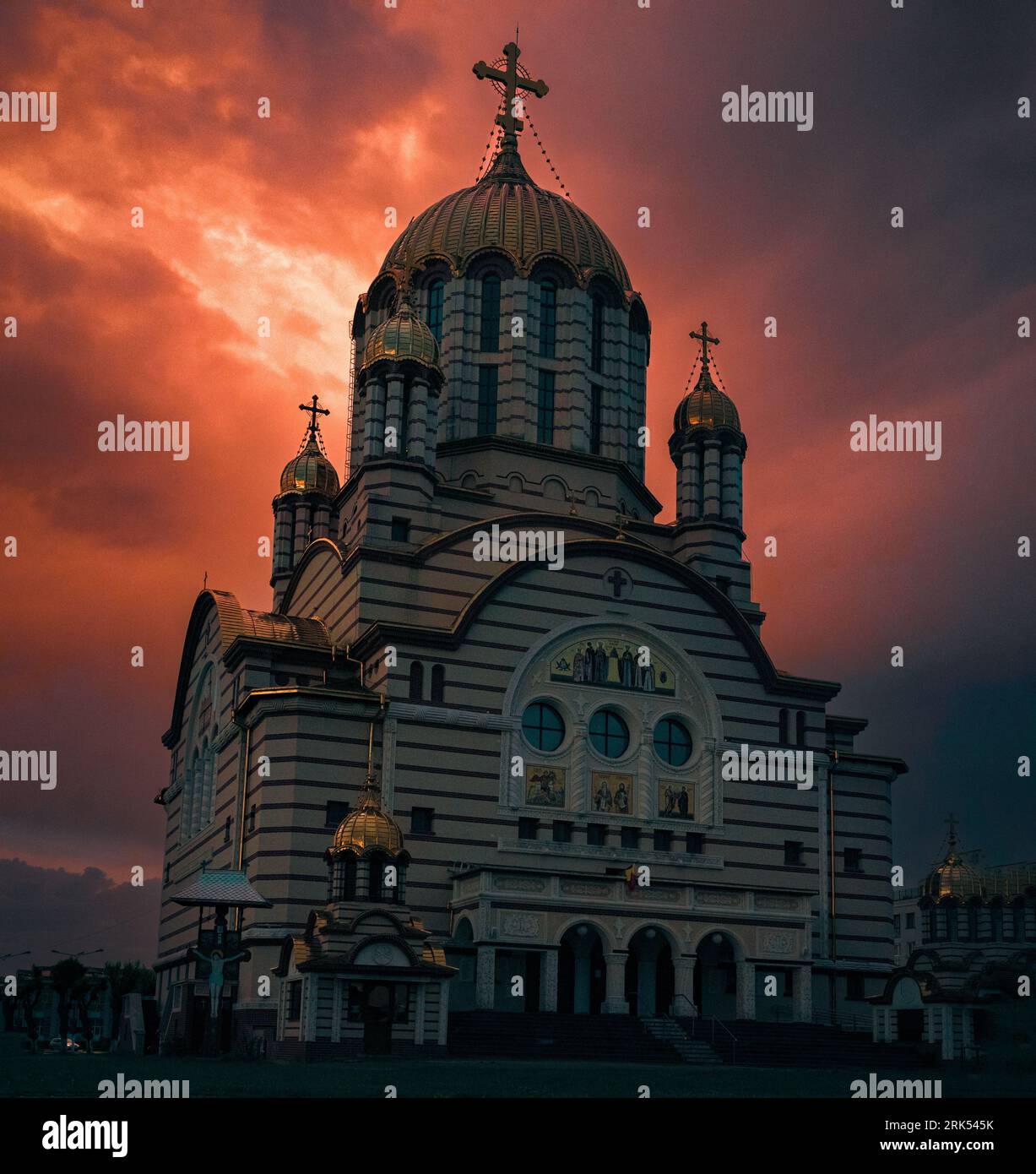 An aerial view of a grand and majestic church featuring numerous spires ...