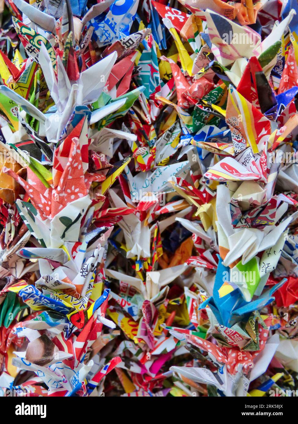 This stock photo features a vibrant and colorful display of origami ...