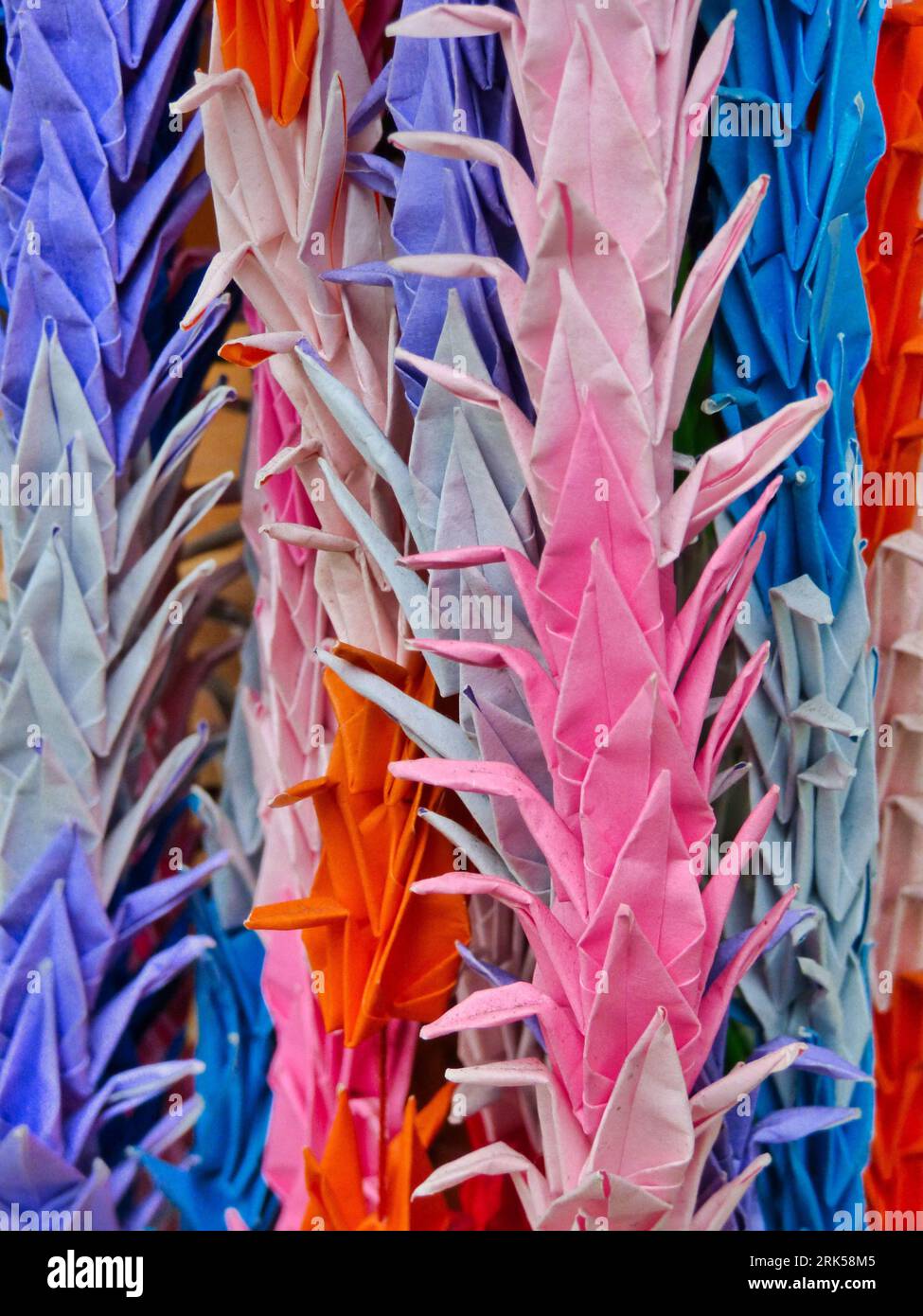 This stock photo features a vibrant and colorful display of origami ...