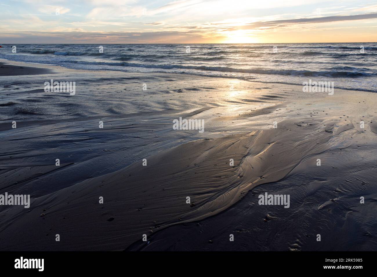 a tidal flat channel at the beach in Oostkapelle on the peninsula ...