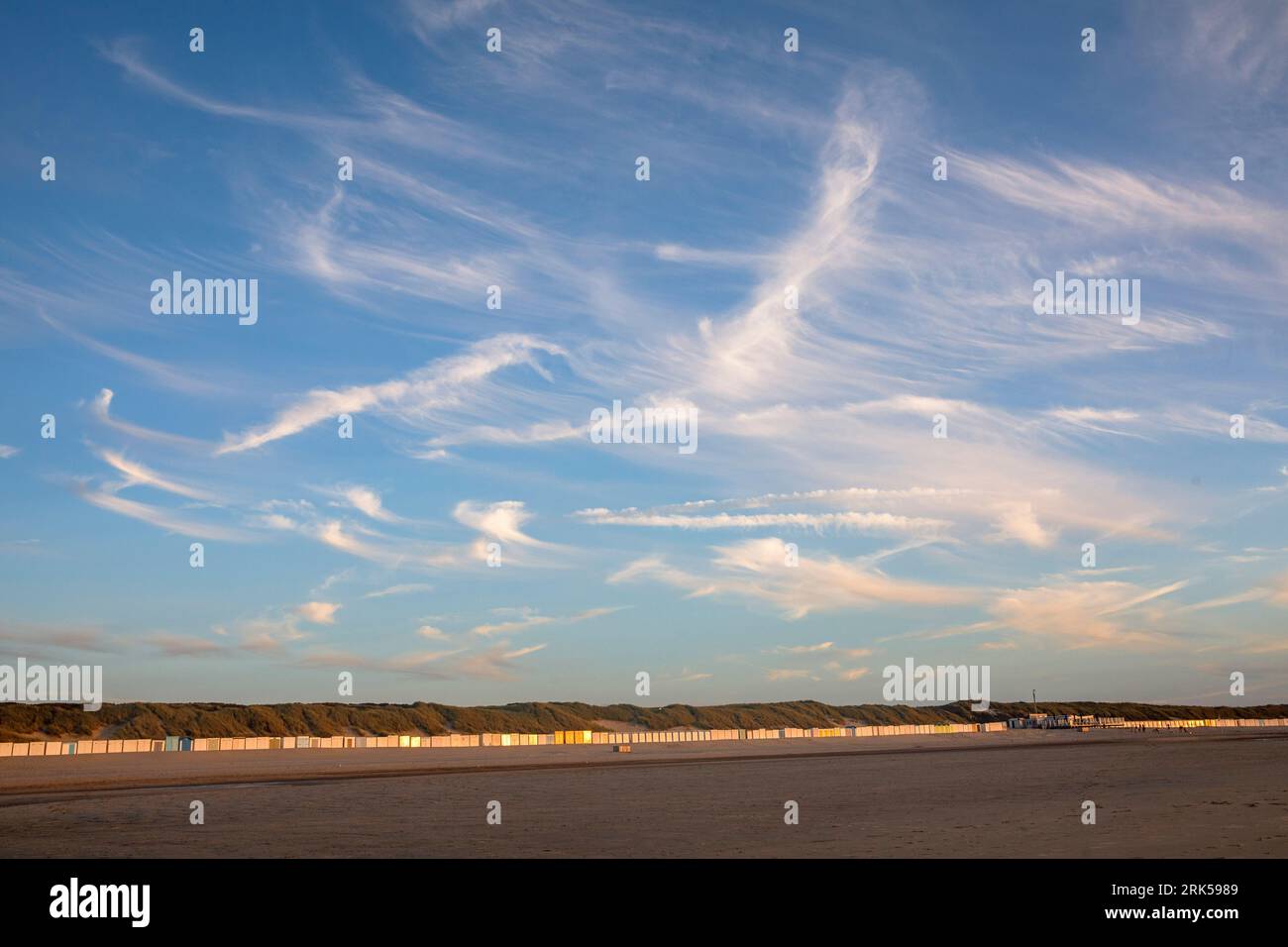 cirrus cloud above the beach in Oostkapelle on the peninsula Walcheren ...