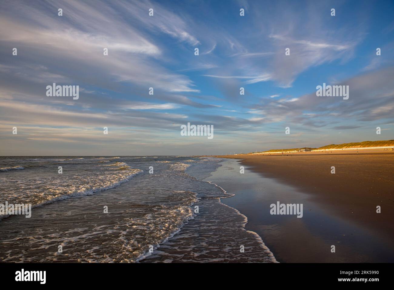 cirrus cloud above the beach in Oostkapelle on the peninsula Walcheren ...