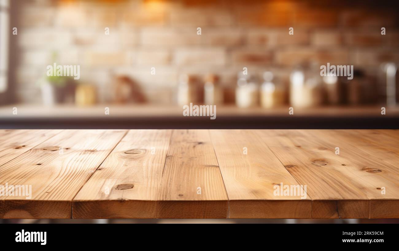 An empty wooden table in front of a modern kitchen counter with glass ...